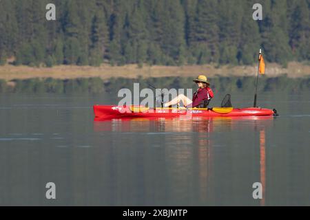 SUSANVILLE CALIFORNIA, USA – JUNE 12, 2024: A male kayak angler trolls ...