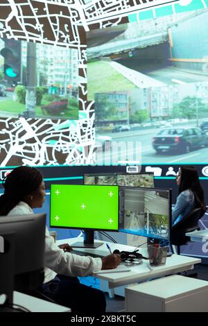 African american dispatch employee uses public satellite sensors to ...