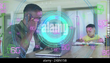 Image of scan scope over african american father and son using laptop ...