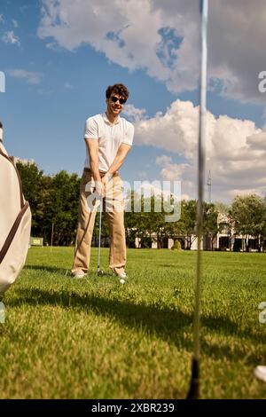 A man in elegant attire plays golf on a lush green field, embodying the ...