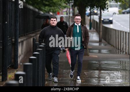 Jordan Devine (left) arrives at Laganside Court, Belfast, where he ...