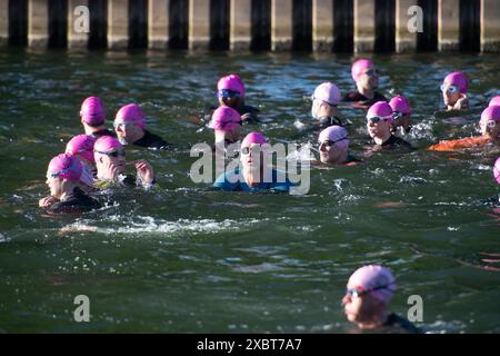 FILE PICS. 13th June, 2024. Triathletes swimming in the River Thames in ...