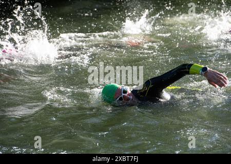 FILE PICS. 13th June, 2024. Triathletes swimming in the River Thames in ...