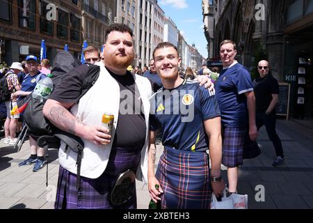 Scotland fan Craig Ferguson (right), who has walked from Scotland to ...
