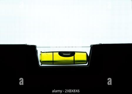 tubular spirit level, inclined, out of balance Stock Photo - Alamy