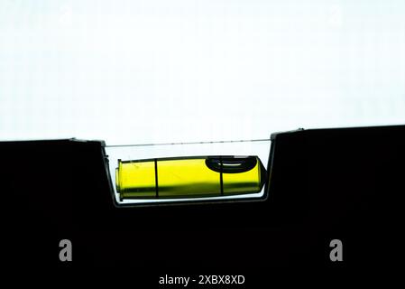 tubular spirit level, inclined, out of balance Stock Photo - Alamy