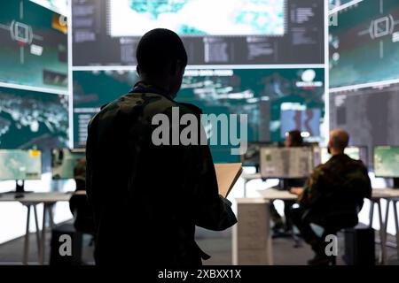 Infantry unit soldier gathering intelligence for the field mission ...