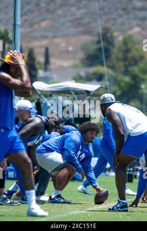 Los Angeles Rams offensive lineman Wyatt Bowles (60) rests on the field ...