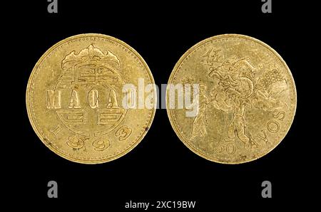 A close-up view of a Macau Pataca 50 avos coin with traditional Chinese ...