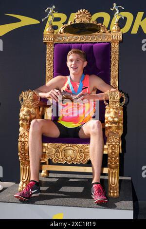 Cooper Lutkenhaus, of the United States, poses for a photo after ...