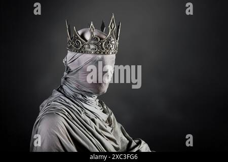 Ghost of a queen or king over dark misty background Stock Photo - Alamy
