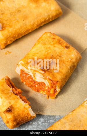 Chicago Style Pizza Puff Pocket with Sauce and Cheese Stock Photo - Alamy