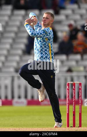 Dan Mousley of Birmingham Bears delivers the ball during the Vitality ...