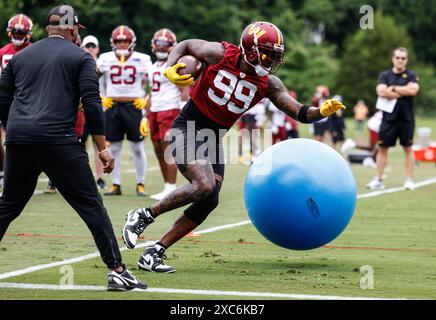 Washington Commanders defensive end Clelin Ferrell (99) works out ...