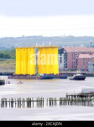 Multratug 19 and Doc Carrier barge laden with six massive wind turbine ...