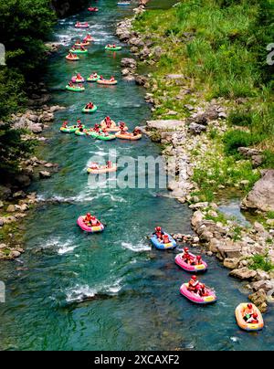 YICHANG, CHINA - JUNE 15, 2024 - Tourists experience canyon rafting ...