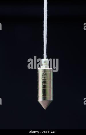 Plumb line, Building hand tool Stock Photo - Alamy