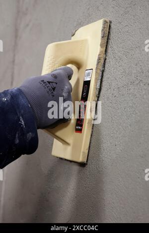Roughcast, grout float, new homes under construction, construction site ...