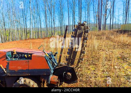 Trencher cable plow tractor is used to lay fiber optic cables Stock ...