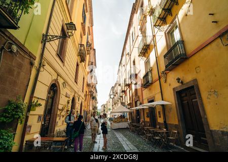 Italy, Bosa, may 1, 2024 old beautiful italian street with colorful ...