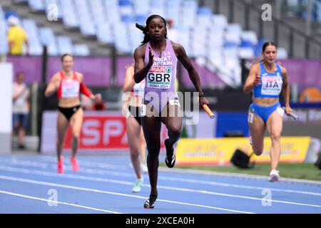 Desiree Henry of Great Britain competes in the 4x100m relay women heat ...