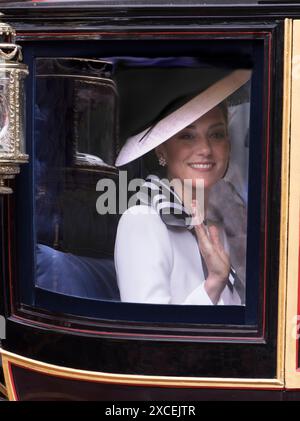Princess of Wales Kate Middleton waving from her navy blue range Rover ...