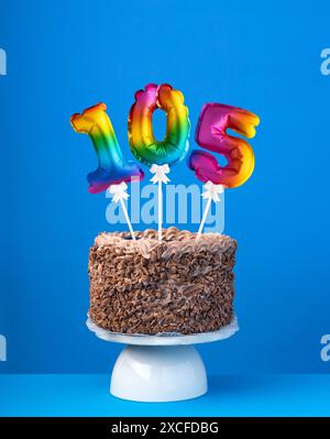 Multicolored balloon for number 105 celebration. Happy birthday on ...
