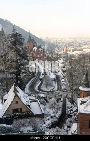 walking through the streets of Heidelberg with snow river Nekar Stock ...