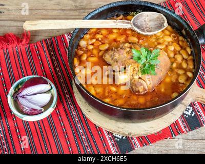Romanian traditional food, beans with smoked pork (fasole cu ciolan ...