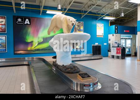 Polar Bear Sculpture on luggage carousel of Yellowknife airport ...