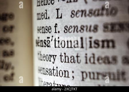 Word sensationalism on dictionary page, macro close-up Stock Photo - Alamy