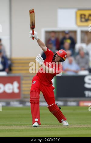 Lancashire's Luke Wells hits out past Kent wicket keeper Harry Finch ...