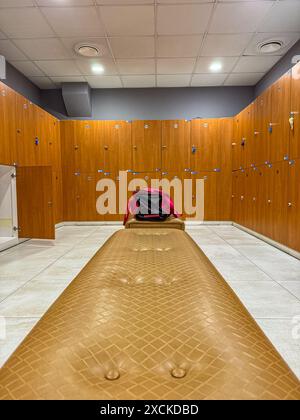 Interior of dressing room with drawers, bench and lamp Stock Photo - Alamy