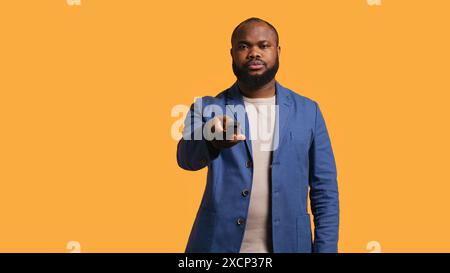 Man zapping through channels, watching news broadcast, isolated over ...