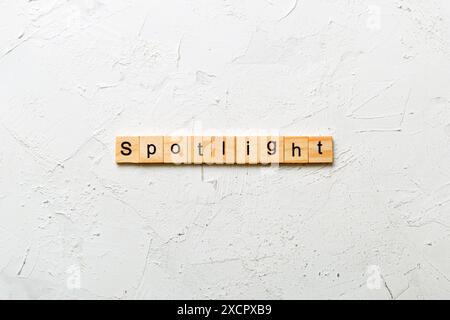spotlight word written on wood block. spotlight text on table, concept ...