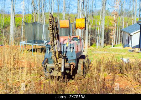 Trencher cable plow tractor is used to lay fiber optic cables Stock ...