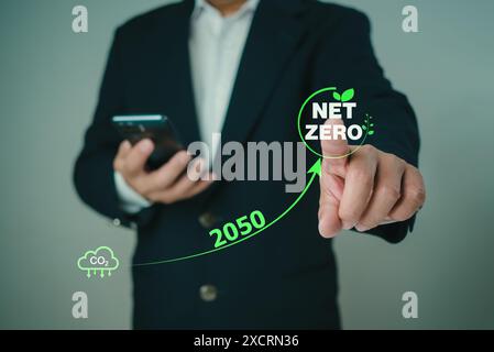 2050 year Net Zero carbon neutral concept. Hand picking a Net Zero ...