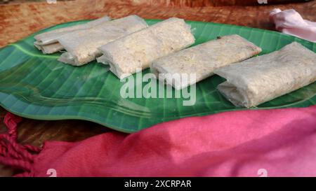 Traditional Andhra sweet Pootharekulu made from paper thin sheet made ...