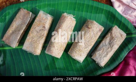Traditional Andhra sweet Pootharekulu made from paper thin sheet made ...