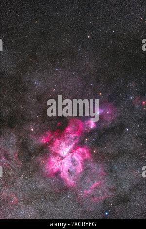 The Carina Nebula and the colourful double star, Chi Velorum Stock ...