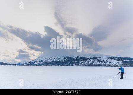 Winter hobby. Taking stunning winter photos. Enjoy beauty of snow ...