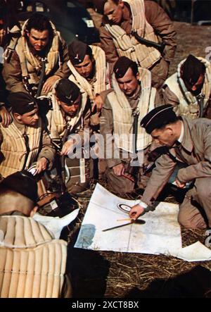 A photograph shows a German Luftwaffe reconnaissance aircraft flying ...