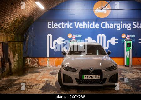 Manchester NCP electric car charging point Stock Photo - Alamy