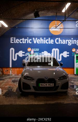 Manchester NCP electric car charging point Stock Photo - Alamy