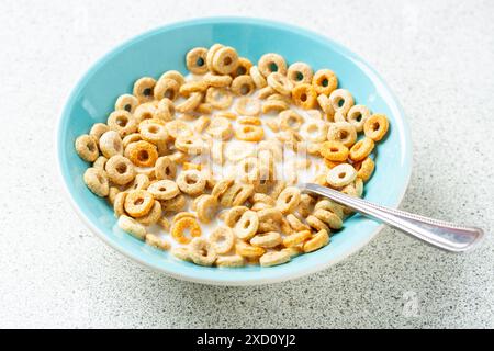A bowl of Multigrain Hoops Cereal with milk Stock Photo - Alamy