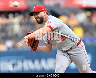 Cincinnati Reds pitcher Sam Moll (50) throws to the Minnesota Twins ...