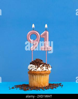 The number 91 in light blue color, photographed from above, placed on a ...
