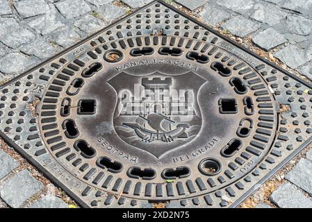 Ornate and detailed man hole cover for sewage in the city of Belgrade ...