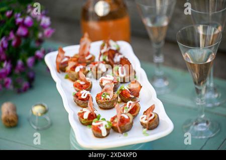 Patatas bravas in mini format and topped with delicious air-dried ham ...