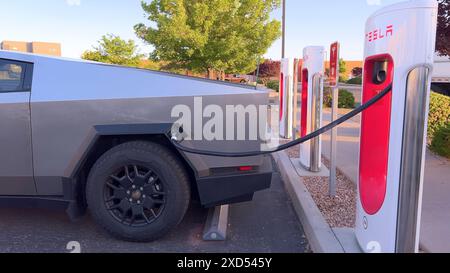 Tesla Cybertruck Charging at Outdoor Supercharger Station Stock Photo ...